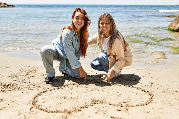 Two women beach Stock Photos, Royalty Free Two women beach Images ...
