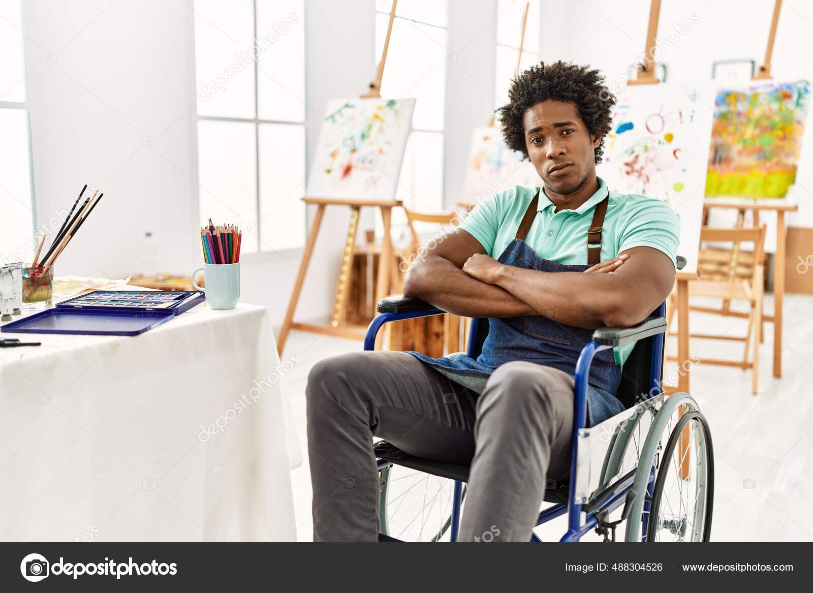 Young African American Artist Man Sitting Wheelchair Art Studio Skeptic ... Young African American Artist Man Sitting Wheelchair Art Studio Skeptic ...