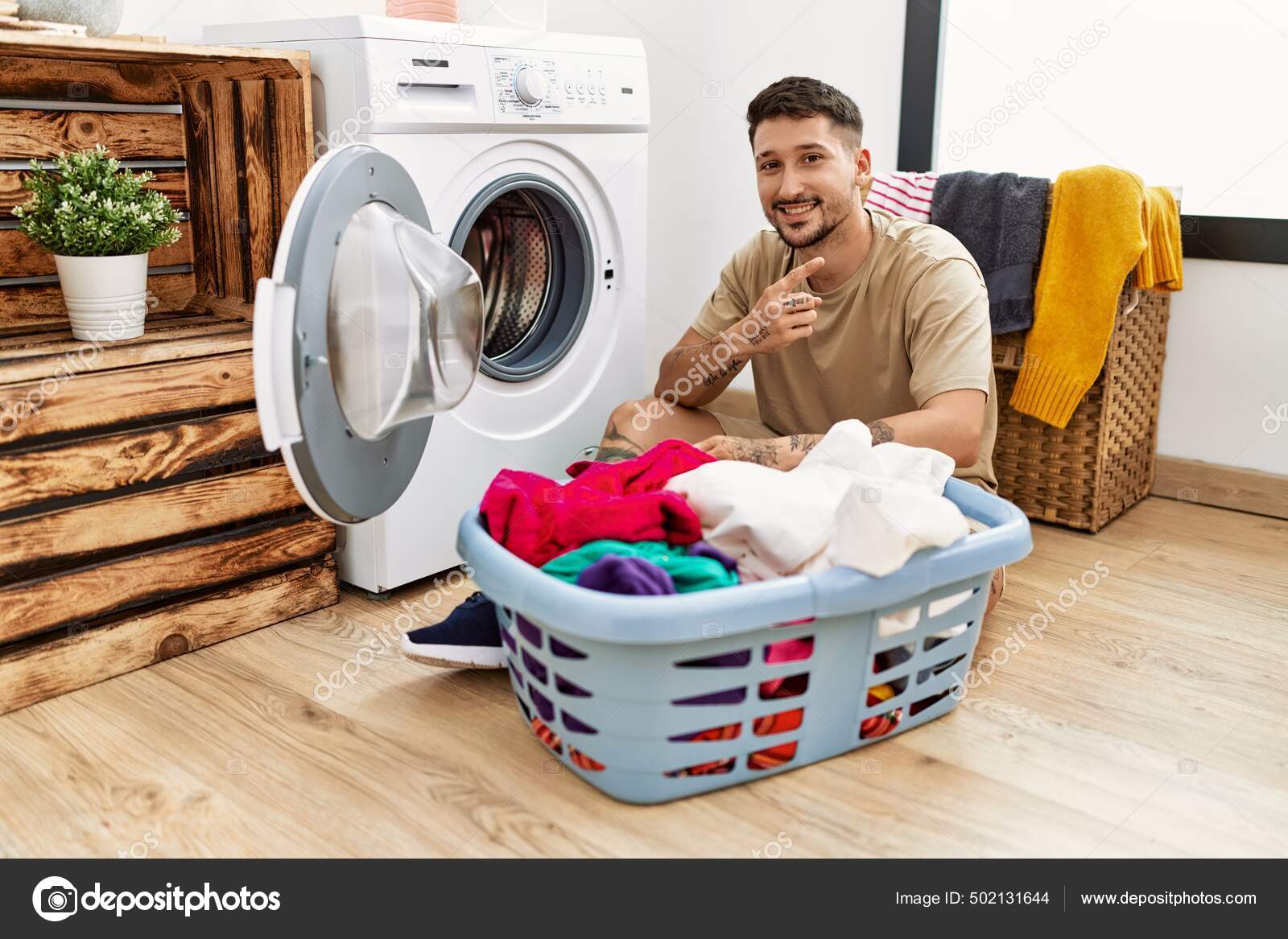 Man Washing Clothes By Hand
