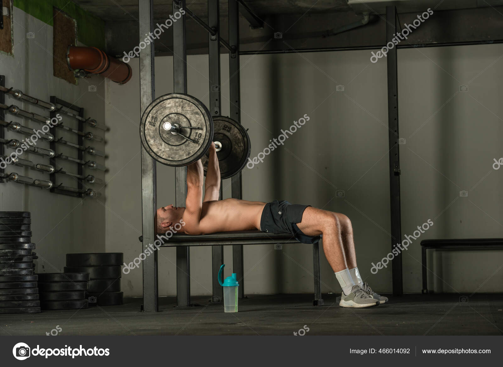 Athletic Muscular Bodybuilder Doing Bench Press Workout Indoors Modern ...