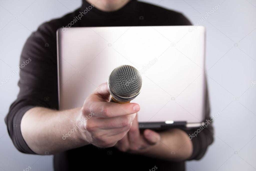 Male hand with microphone Stock Photo by ©SectoR_2010 66136569