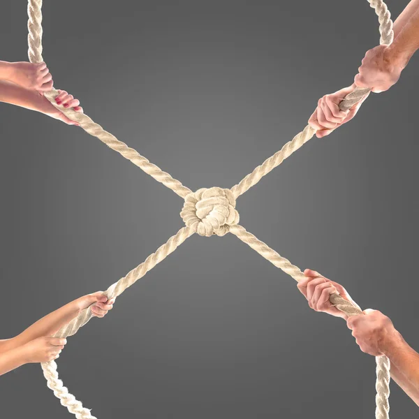 Hands of people pulling the rope on white background. Competition ...