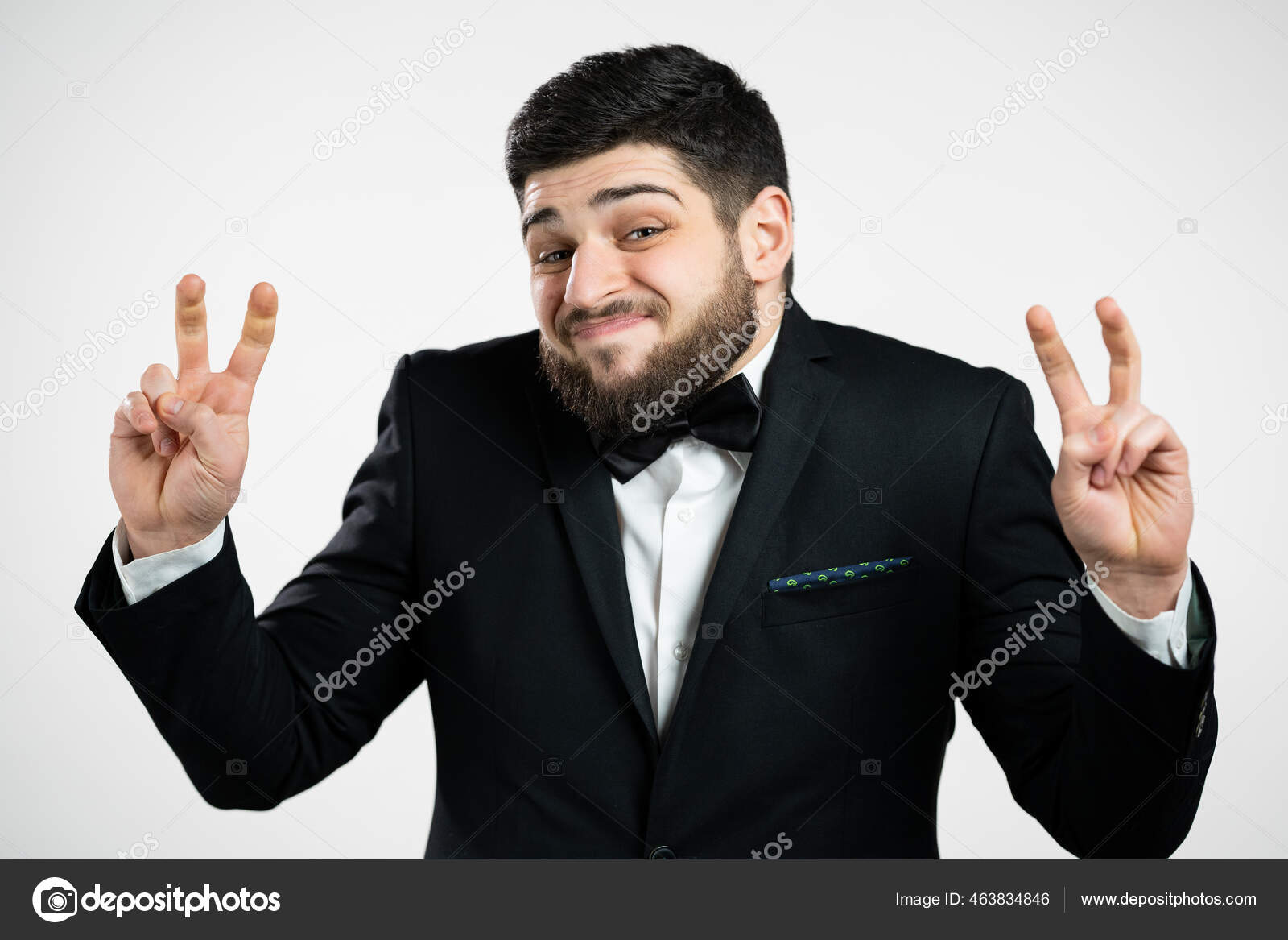 Handsome man showing with hands and two fingers air quotes gesture ...