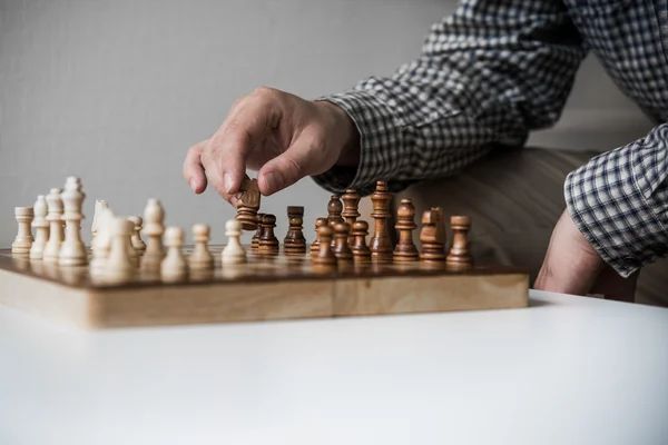 Man play chess game - Stock Image - Everypixel
