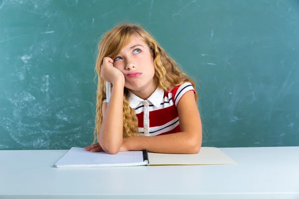 Boring sad expression student schoolgirl on desk Stock Photo by ...