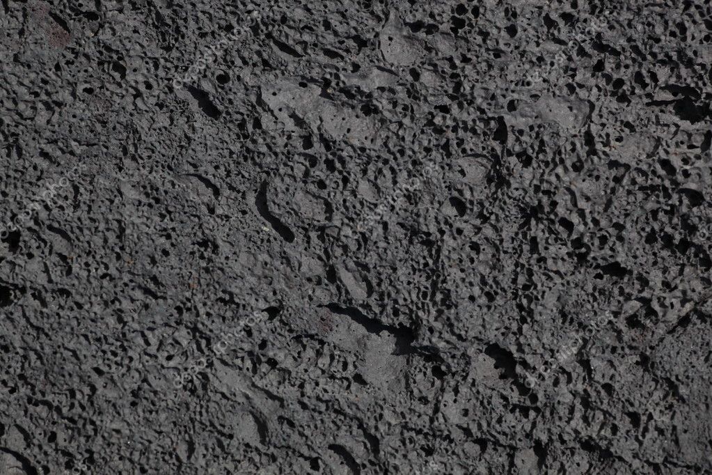 Black lava stones texture Stock Photo by ©amikphoto 115178576