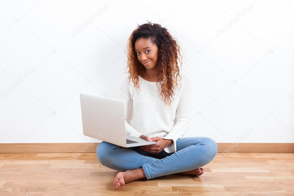 African American student girl with laptop computer Stock Photo by ...