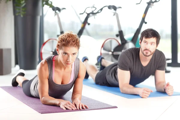 Man and woman training together - Stock Image - Everypixel
