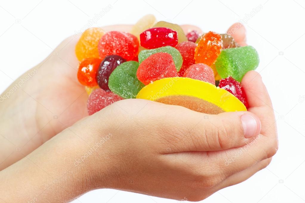 Child hands with colorful sweets and jelly Stock Photo by ©borusikk ...