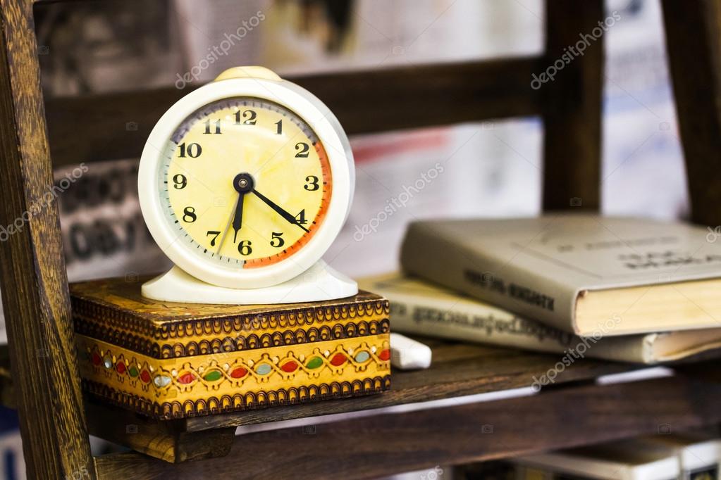 Retro alarm clock with book Stock Photo by ©Rashevskiy 79097496