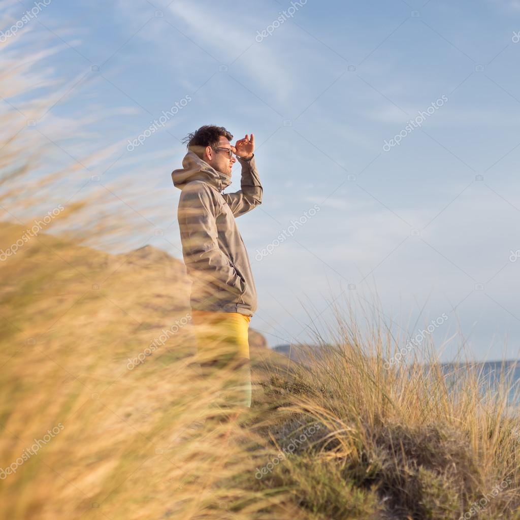 Free active man enjoying beauty of nature. Stock Photo by ©kasto 119435720