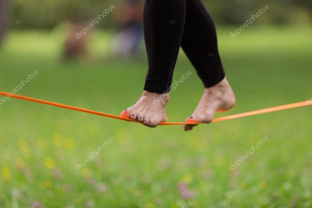 Slack line in the city park. Stock Photo by ©kasto 52523637