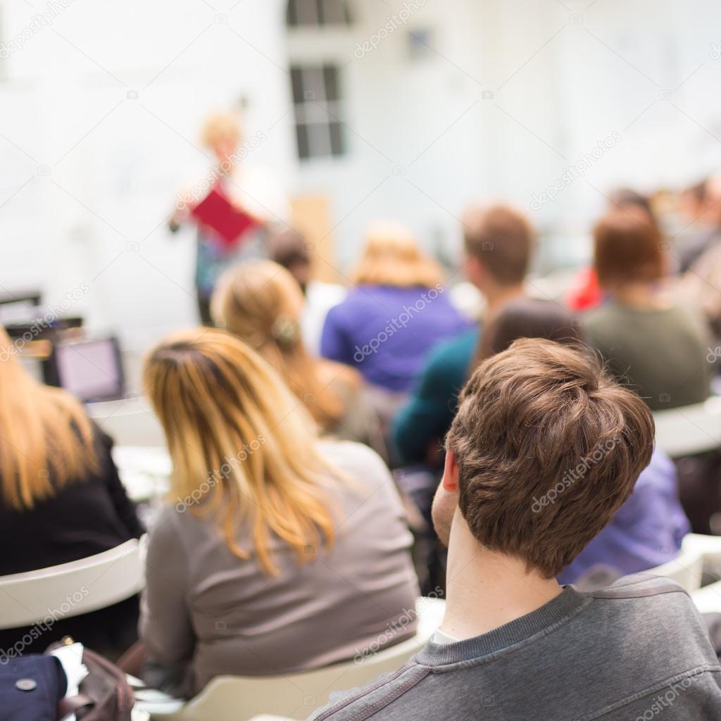 Woman lecturing at university. Stock Photo by ©kasto 68969987