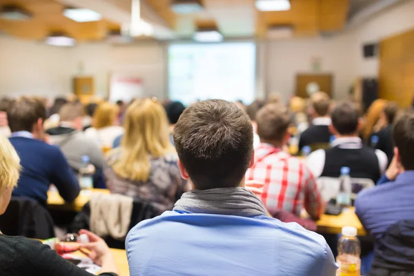 Woman lecturing at university. Stock Photo by ©kasto 68969987