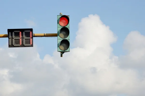 Traffic lights over blue sky Stock Photo by ©monticello 118614416