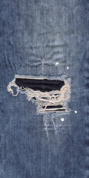 Seamless blue denim cotton jeans ripped fabric texture background and ...