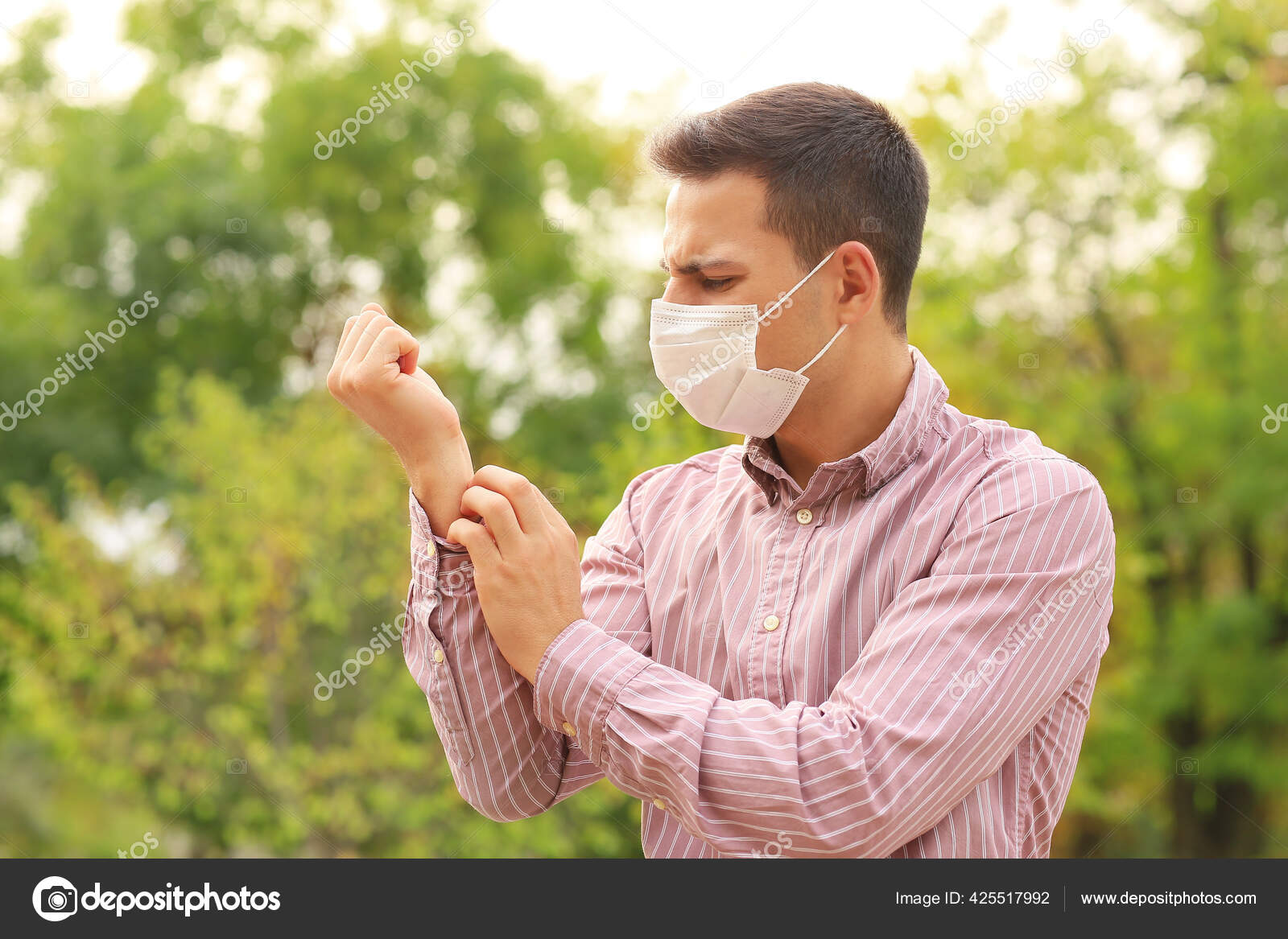 Allergic Young Man Scratching Himself Outdoors Stock Photo by ©serezniy ...