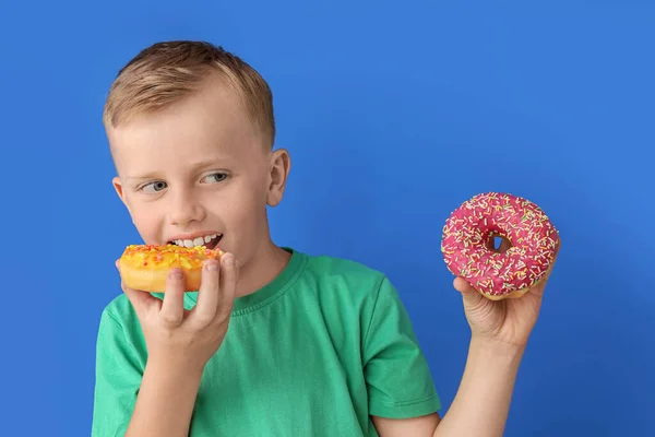 Funny Little Boy Donuts Color Background Stock Photo by ©serezniy 432787762
