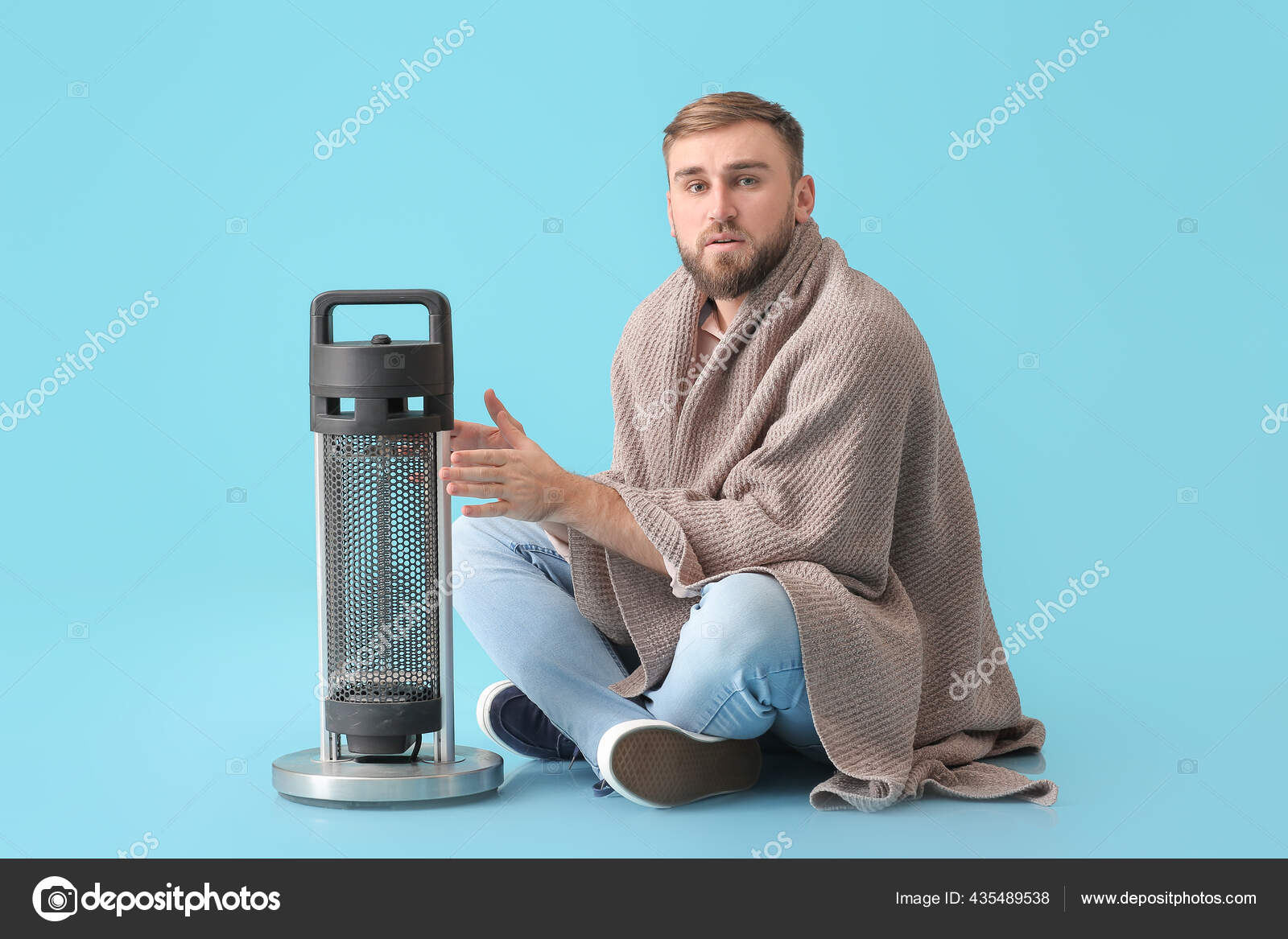 Young Man Warming Hands Electric Heater Color Background Concept ...