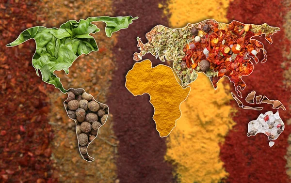 Map of world made from different kinds of spices on wooden background ...