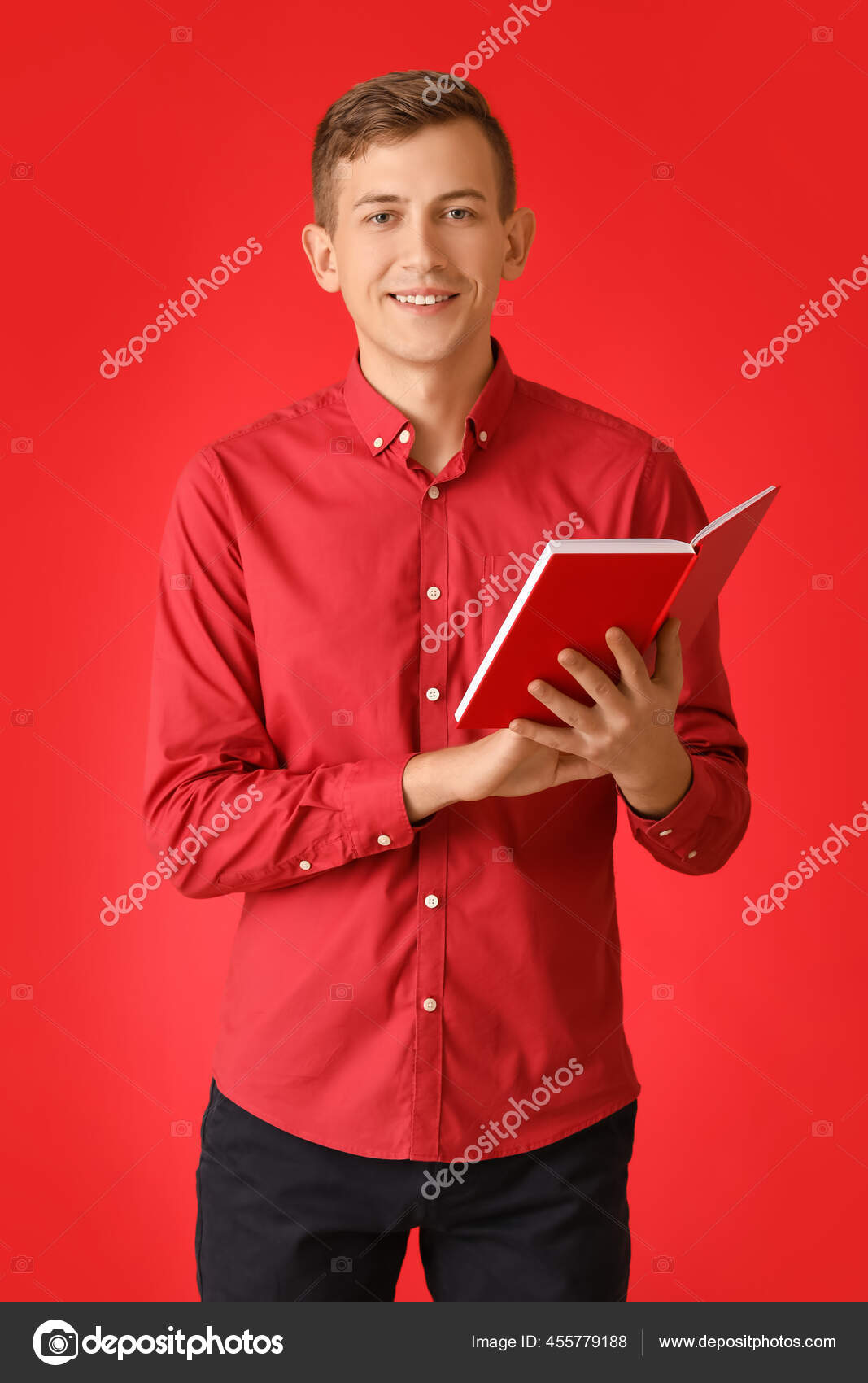 Young Man Red Book Color Background — Stock Photo © serezniy #455779188