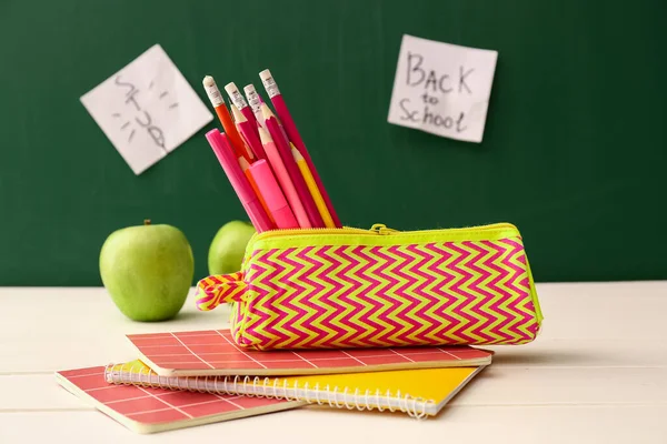 Pencil Case Stationery Dark Background Stock Photo by ©serezniy 475317576