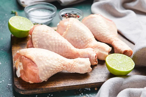 Board Raw Chicken Legs Color Background — Stock Photo © serezniy #482980566