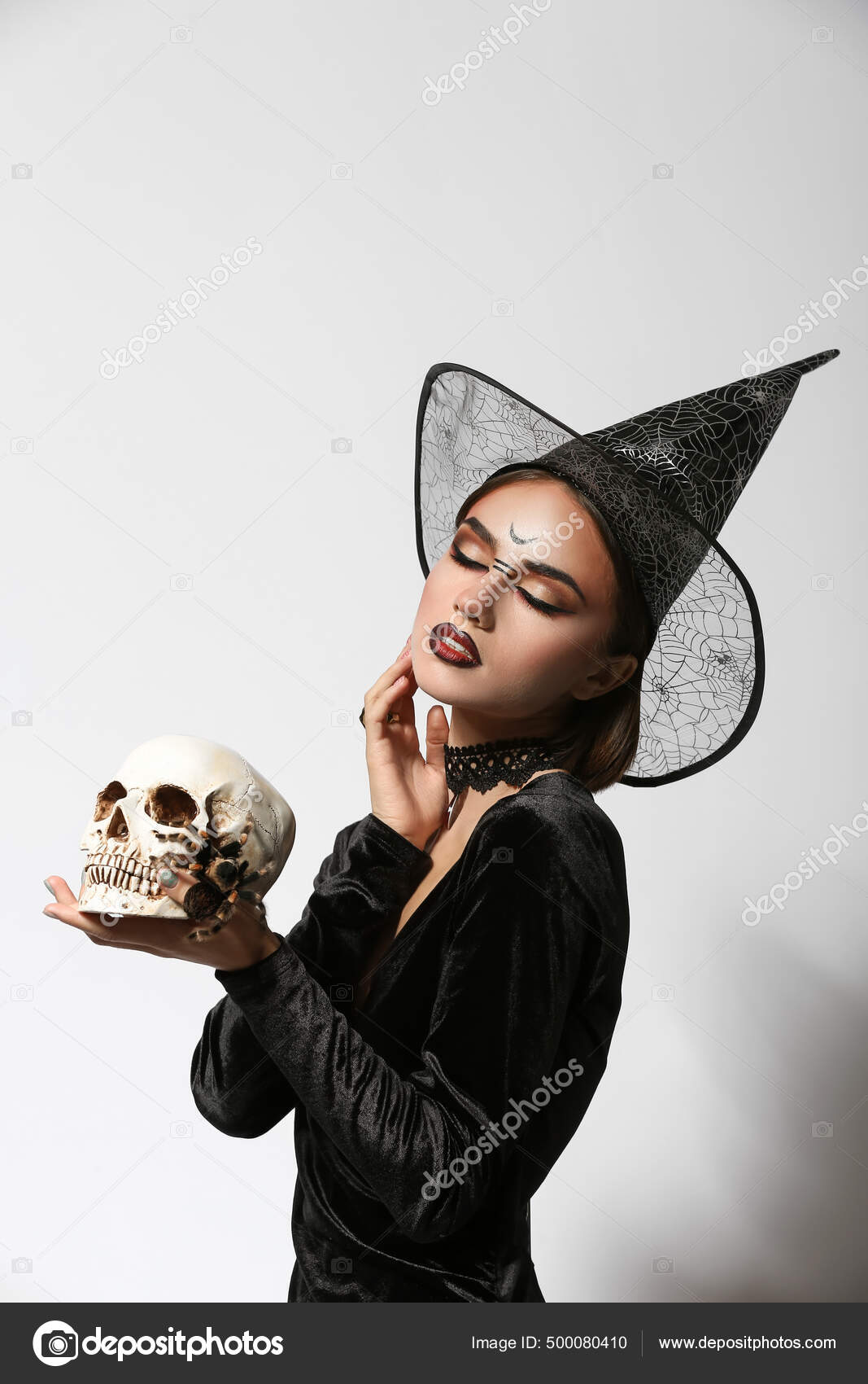 Young Witch Skull Spider Light Background Stock Photo by ©serezniy ...