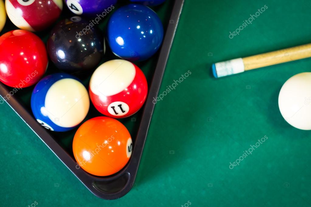 Billiard balls in a pool table — Stock Photo © zorandim #95210488