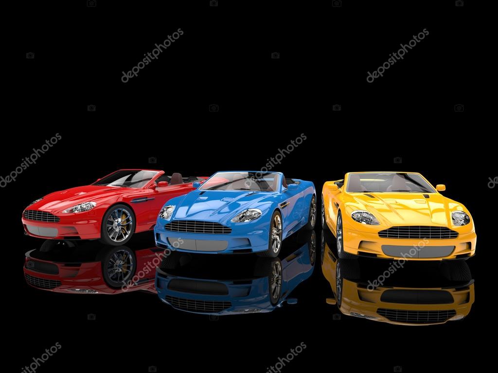 Convertible sports cars - primary colors - on black reflective ...