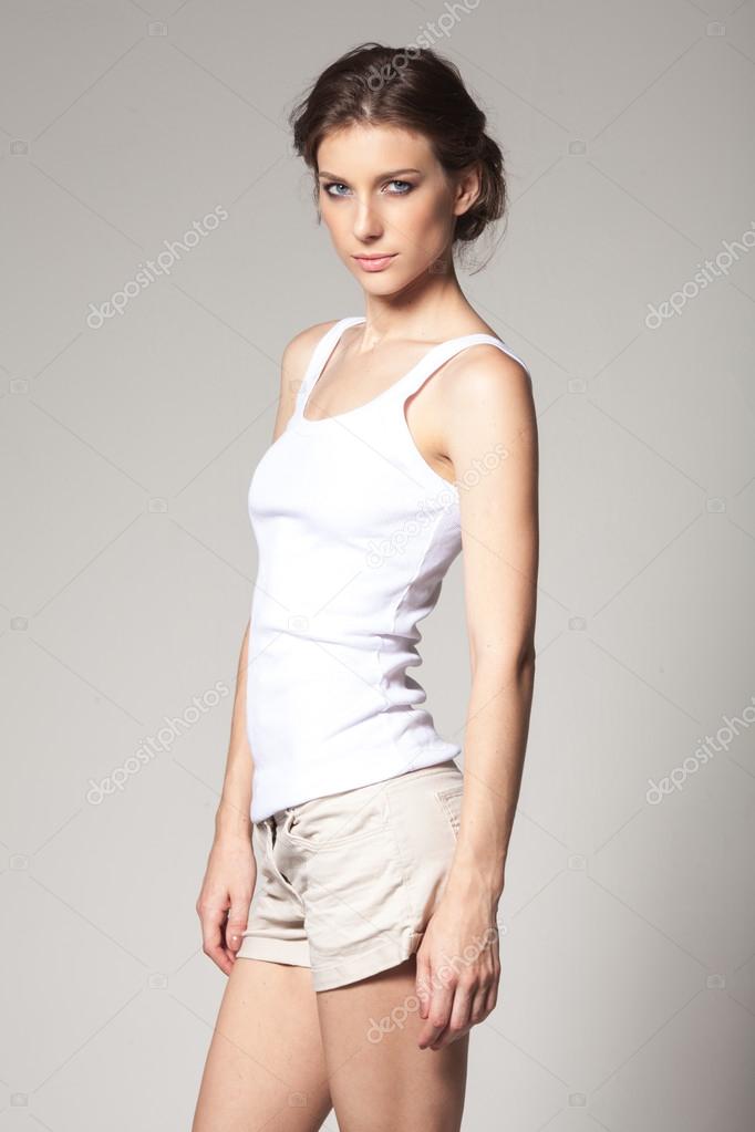 Beautiful young slim model Stock Photo by ©ardni 64025529