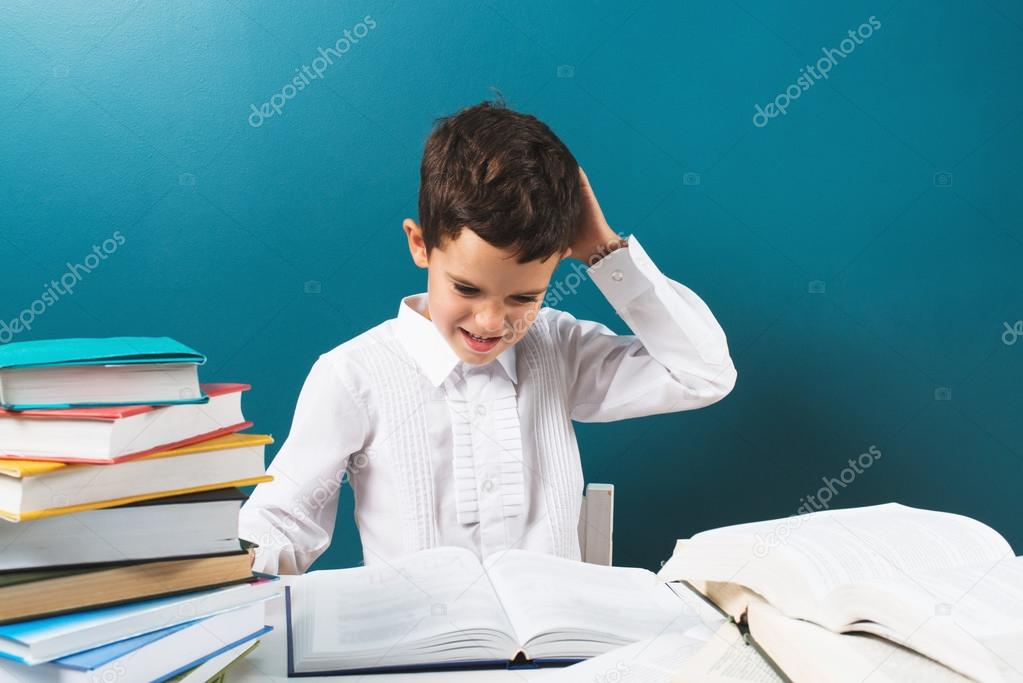 Student at elementary school thinking about problem solving Stock Photo ...