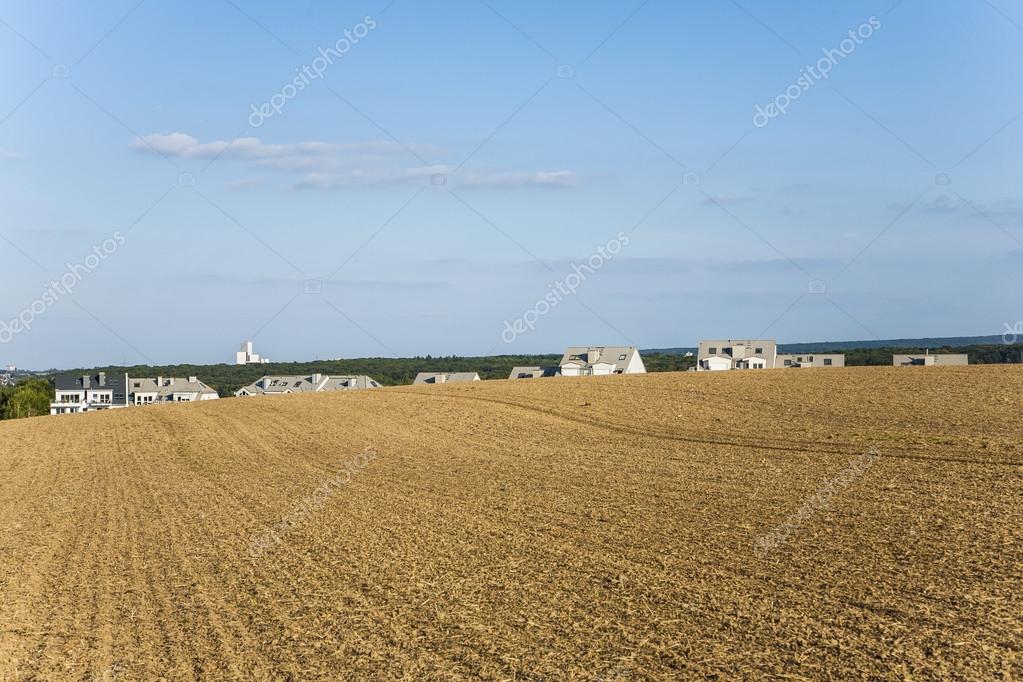 New built housing area in rural landscape w Stock Photo by ©Hackman ...