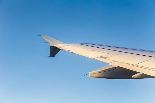 Wing of airplane from window - Stock Image - Everypixel