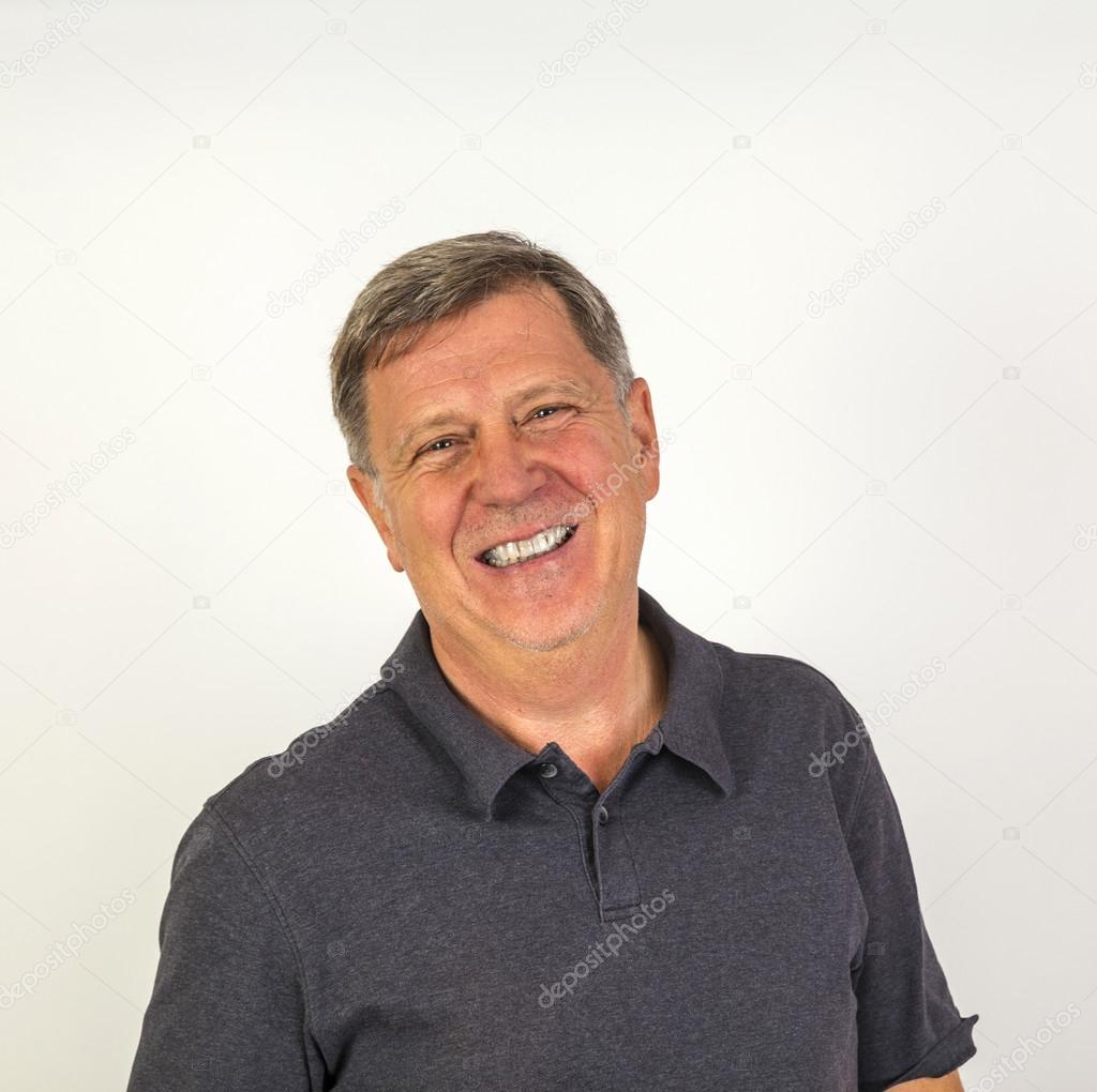 Handsome middle age man studio portrait Stock Photo by ©Hackman 90017970