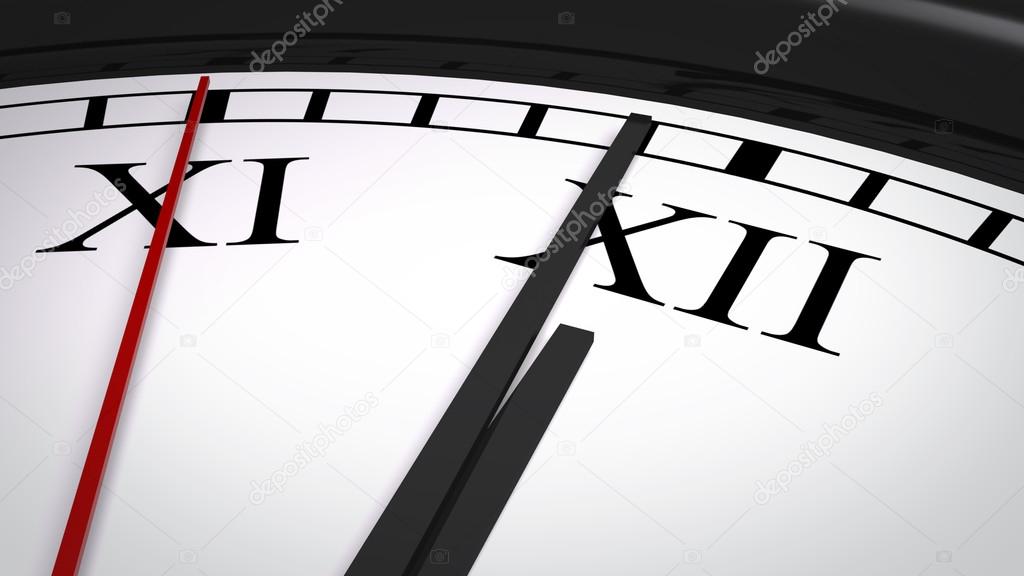 Close-up clock with Roman numerals striking twelve o'clock Stock Photo ...
