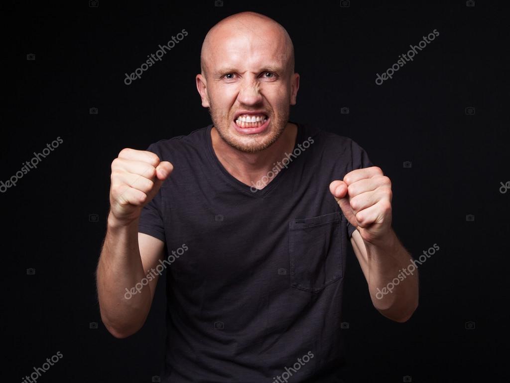 Portrait of an angry bald man Stock Photo by ©Zdyma4 118576218