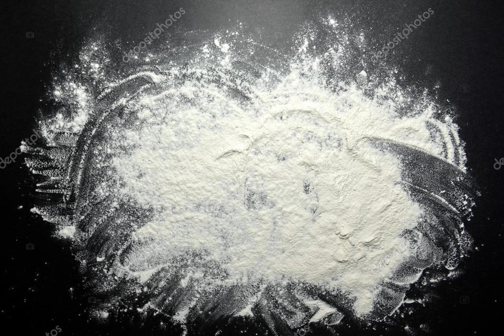White flour on black background Stock Photo by ©svedoliver 57114553