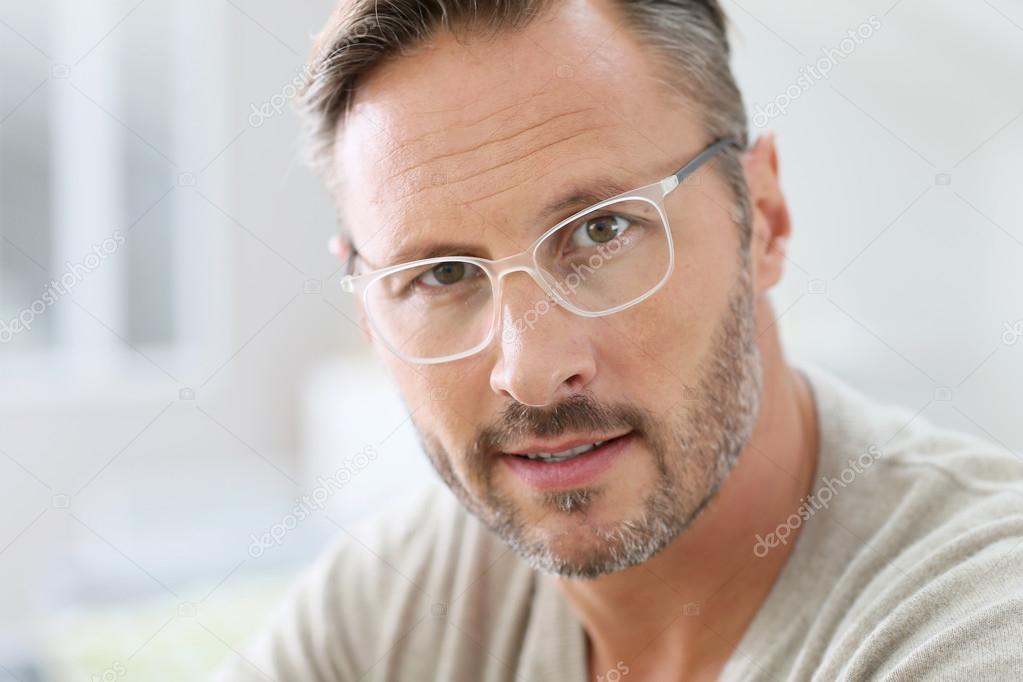 Handsome man wearing eyeglasses Stock Photo by ©Goodluz 102876114 Handsome man wearing eyeglasses Stock Photo by ©Goodluz 102876114