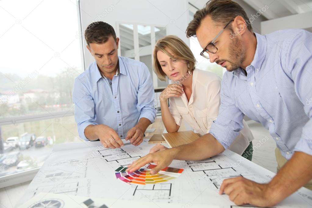 Architects meeting in office — Stock Photo © Goodluz #102975674