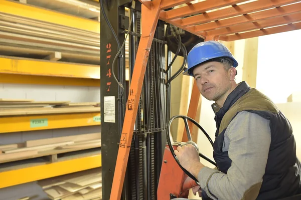 Operator driving trolley Stock Photo by ©Goodluz 67891737
