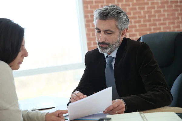 Attorney meeting client in office Stock Photo by ©Goodluz 70976751