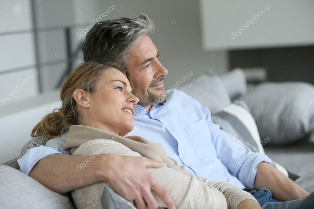Couple relaxing at home — Stock Photo © Goodluz #70978155