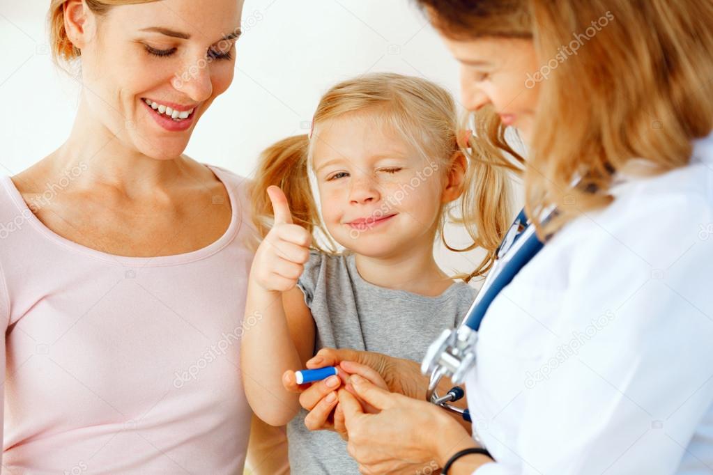 Doctor taking blood test from small patient. Stock Photo by ...
