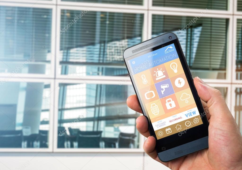 Man with smart home security app Stock Photo by ©aa-w 71959155