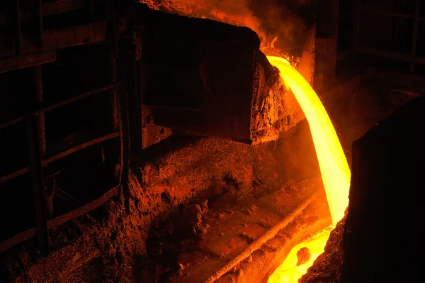 Pouring of liquid metal - Stock Image - Everypixel