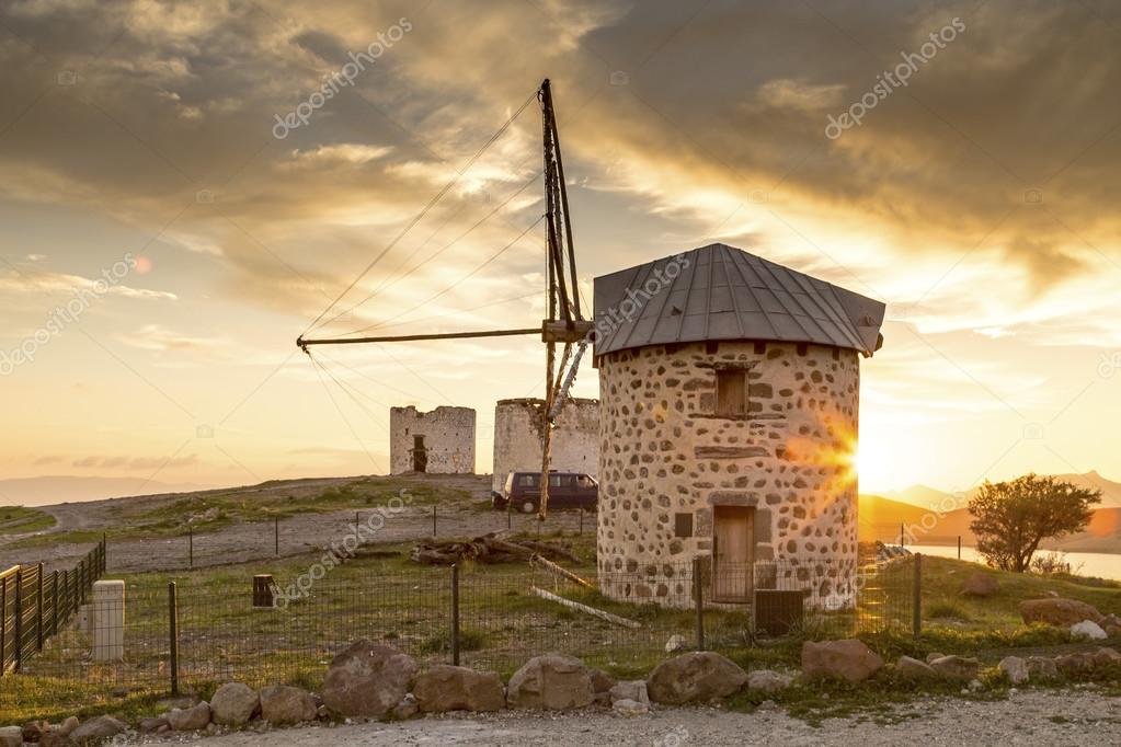 Ancient windmills of Bodrum Peninsula in the sunset, Aegean coast of ...