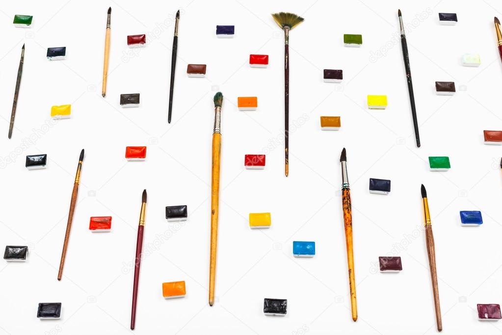 Side view of many paint brushes and watercolors Stock Photo by ...