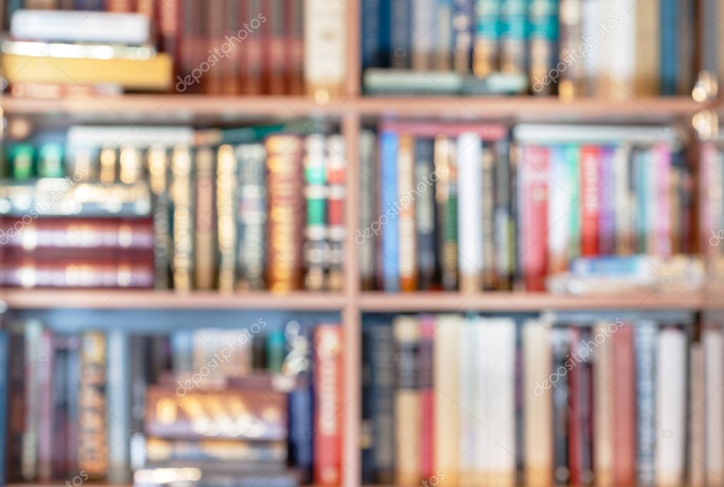 Blurred background from books in library Stock Photo by ©vvoennyy 81927064