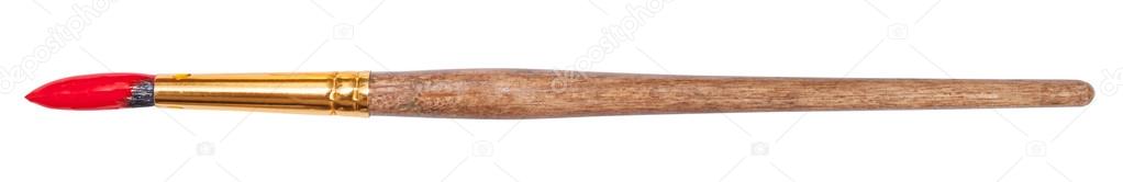 Round artistic paint brush with red painted tip — Stock Photo ...